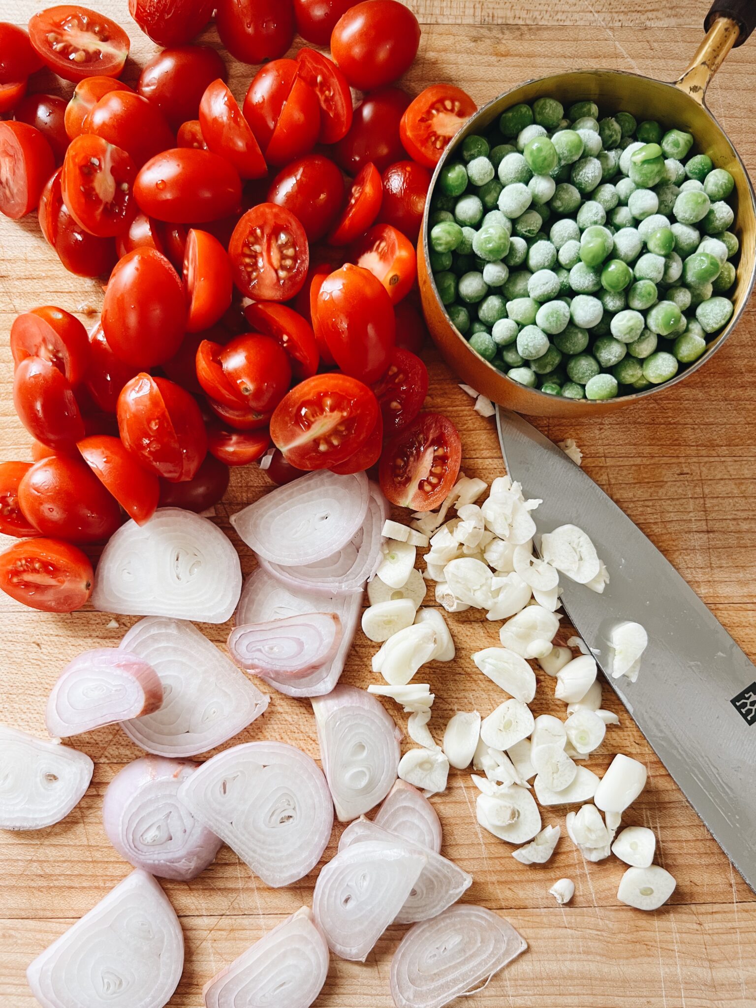 Skillet Shellbows with Shallots, Peas and Tomatoes - Bev Cooks